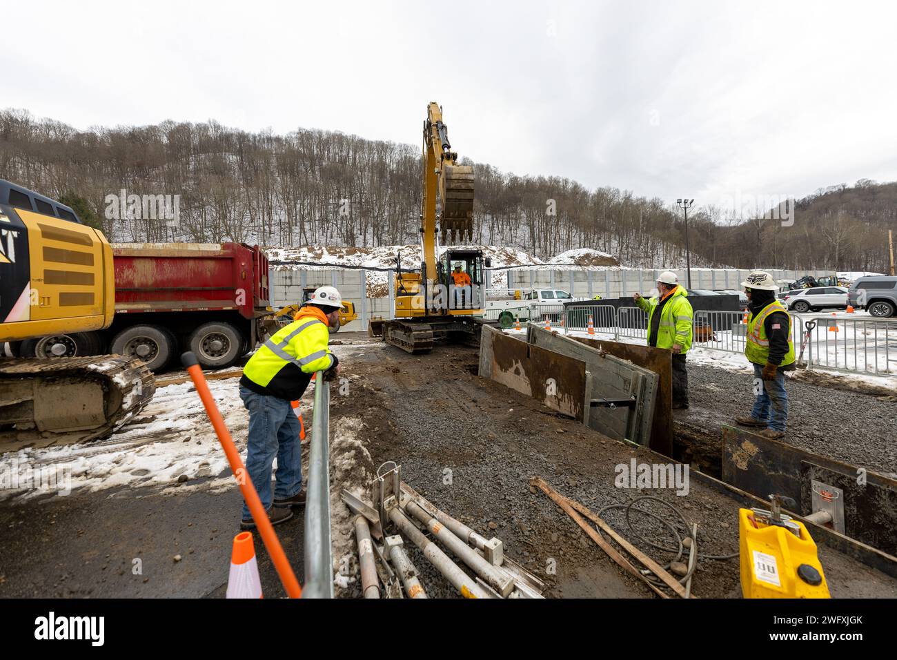 A construction crew working for the U.S. Army Corps of Engineers ...