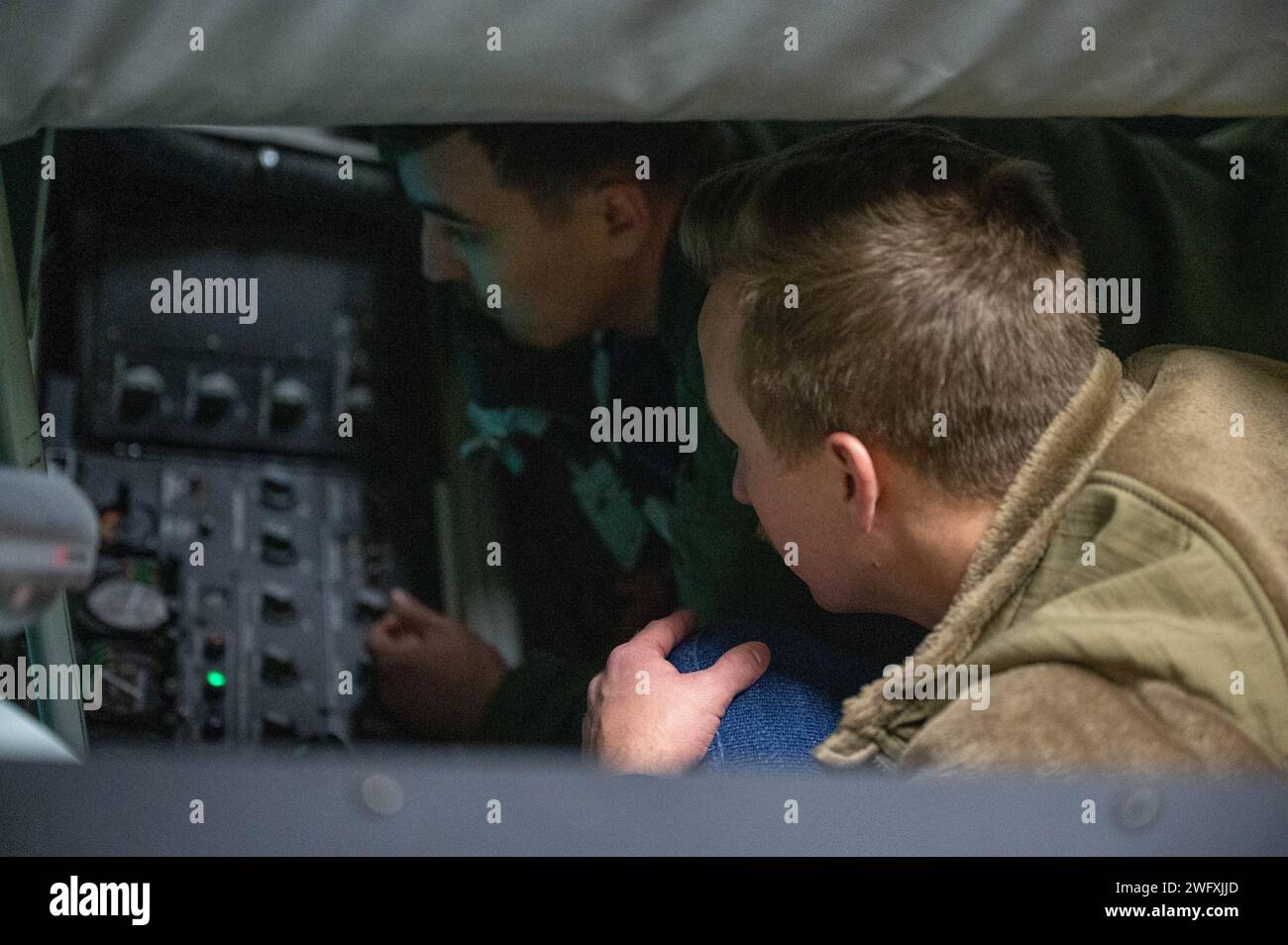 U.S. Air Force Tech. Sgt. Alex Esquibel (left), 54th Air Refueling ...