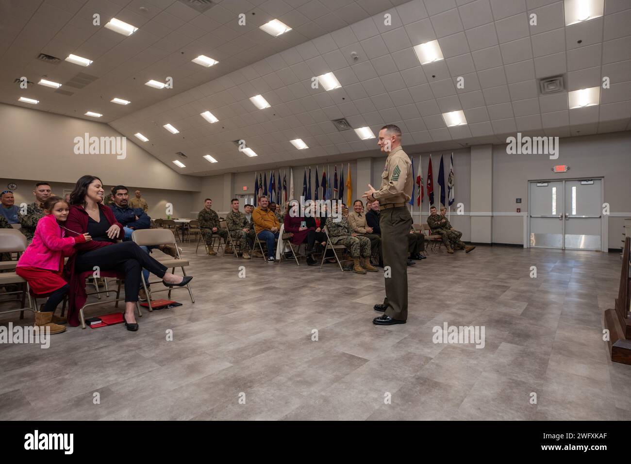 U.S. Marine Corps 1st Sgt. Neill A. Sevelius gives a speech during his ...