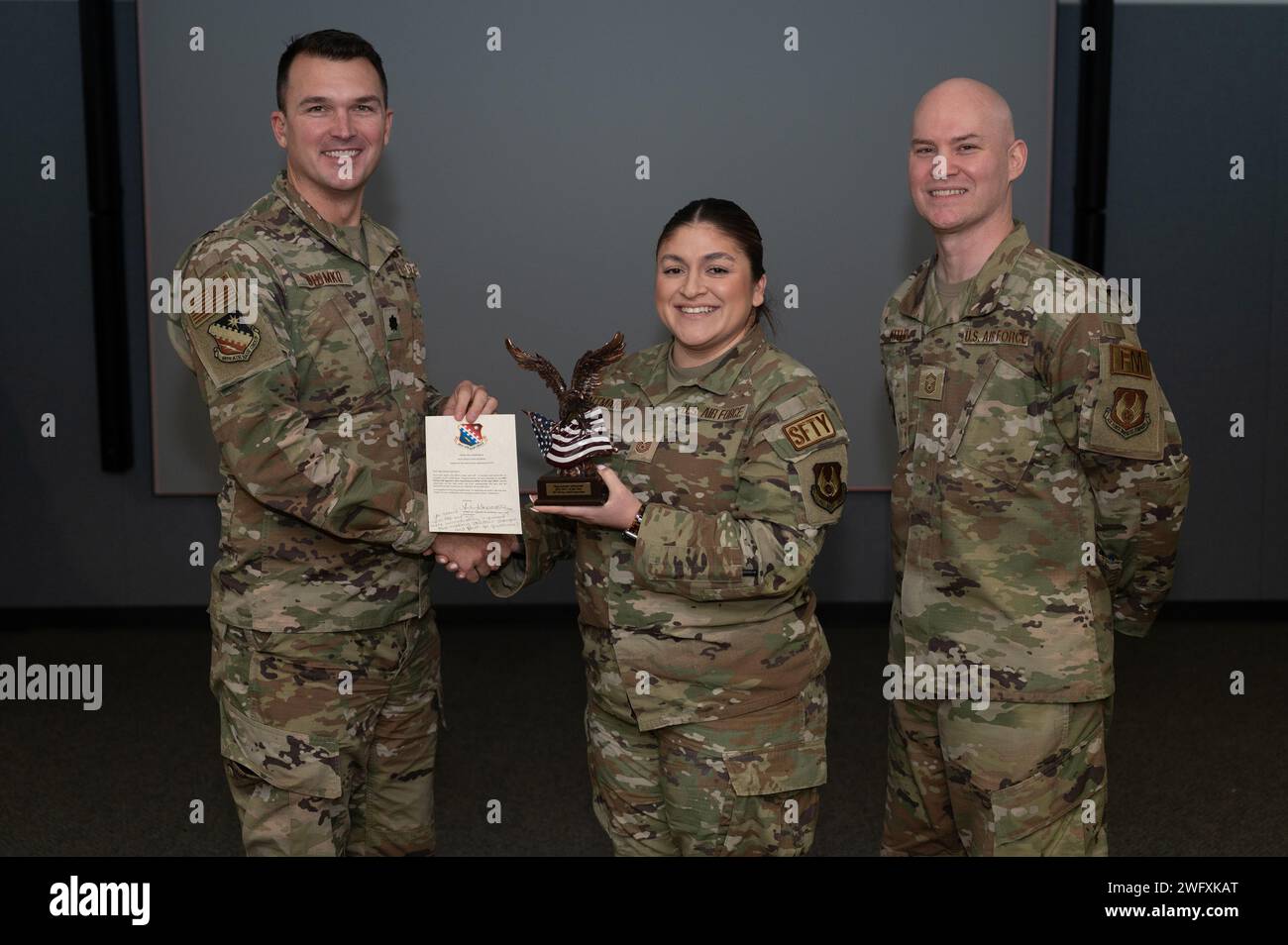 Lt. Col. Joshua Shimko, left, 66th Air Base Group deputy commander, and ...