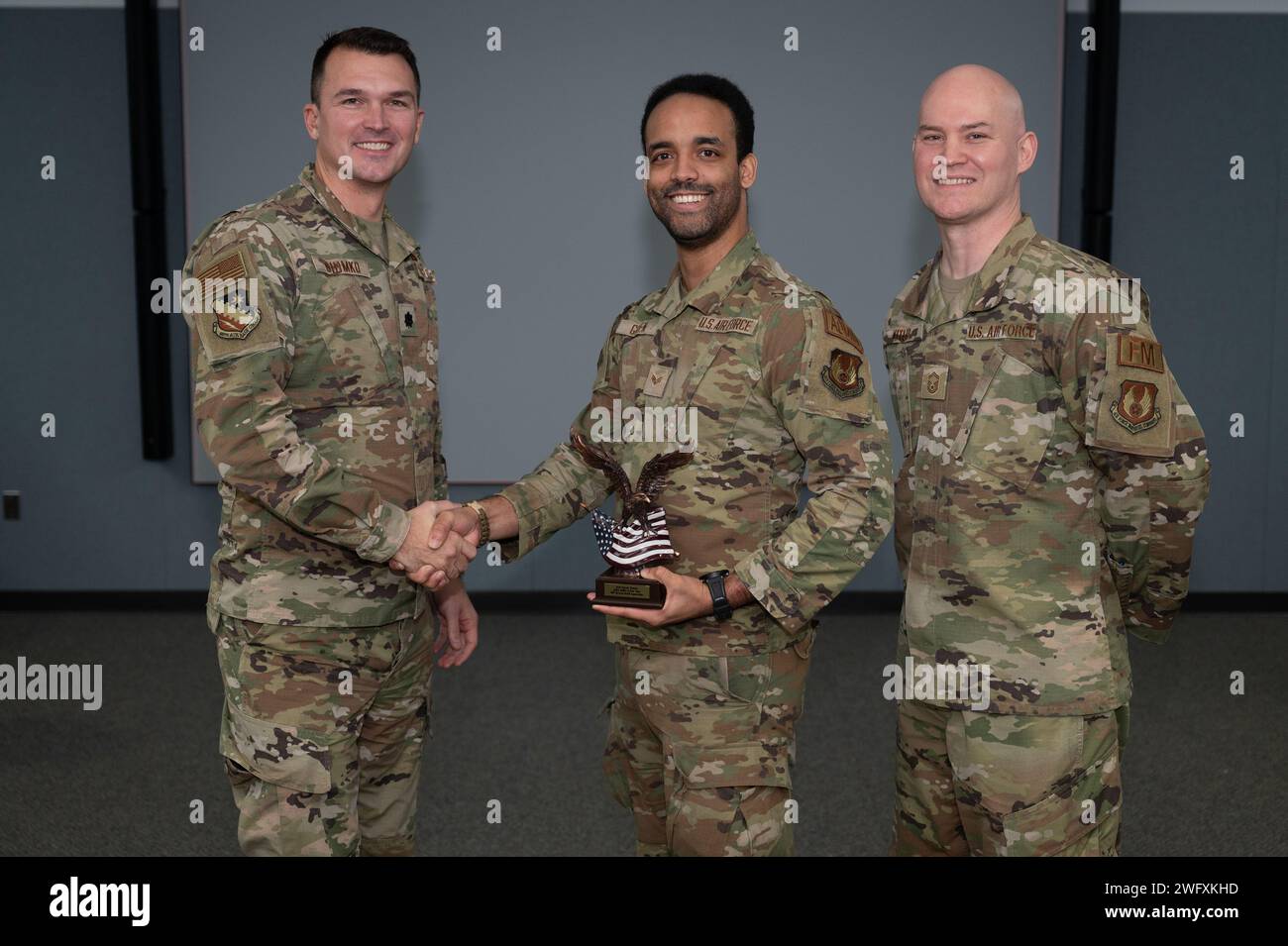 Lt. Col. Joshua Shimko, left, 66th Air Base Group deputy commander, and ...