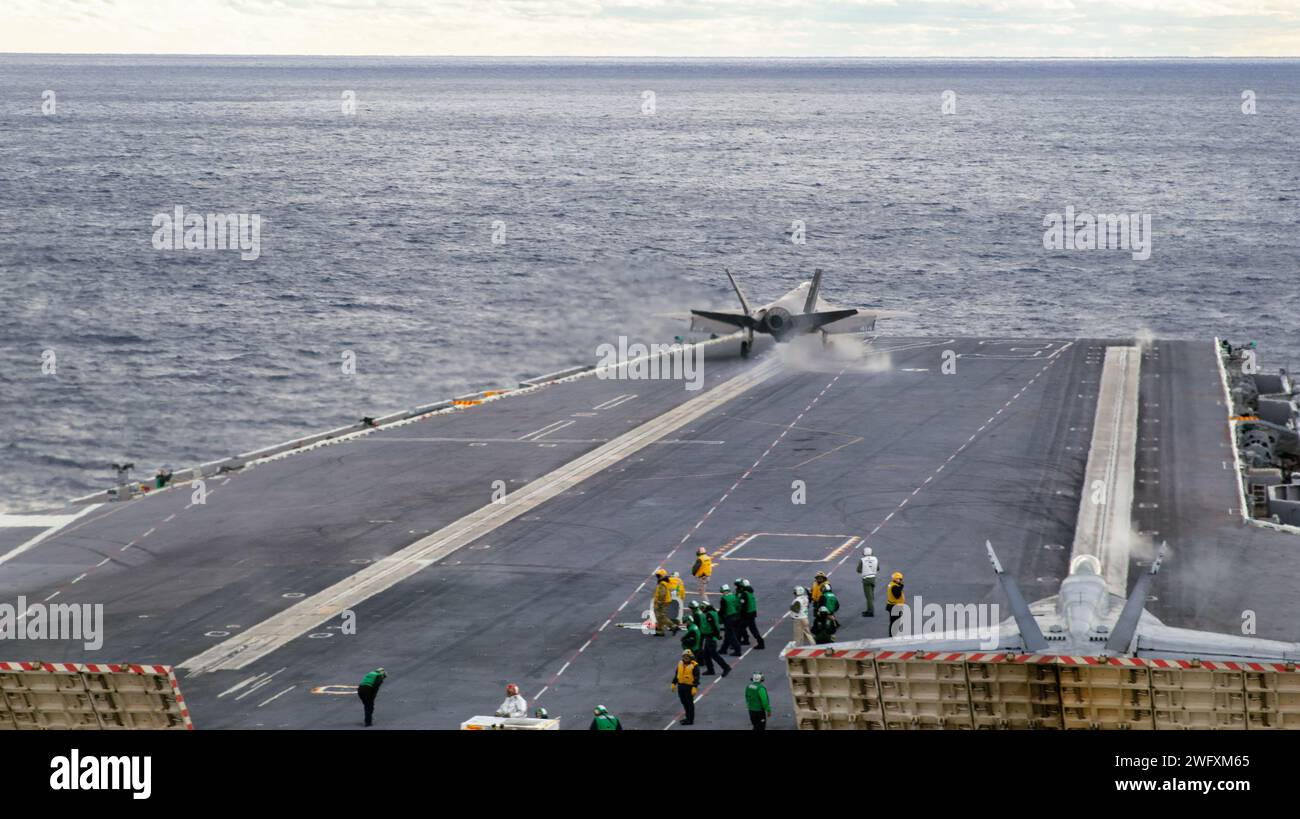 An F-35C Lightning assigned to Strike Fighter Squadron (VFA) 147 launches from the flight deck ...