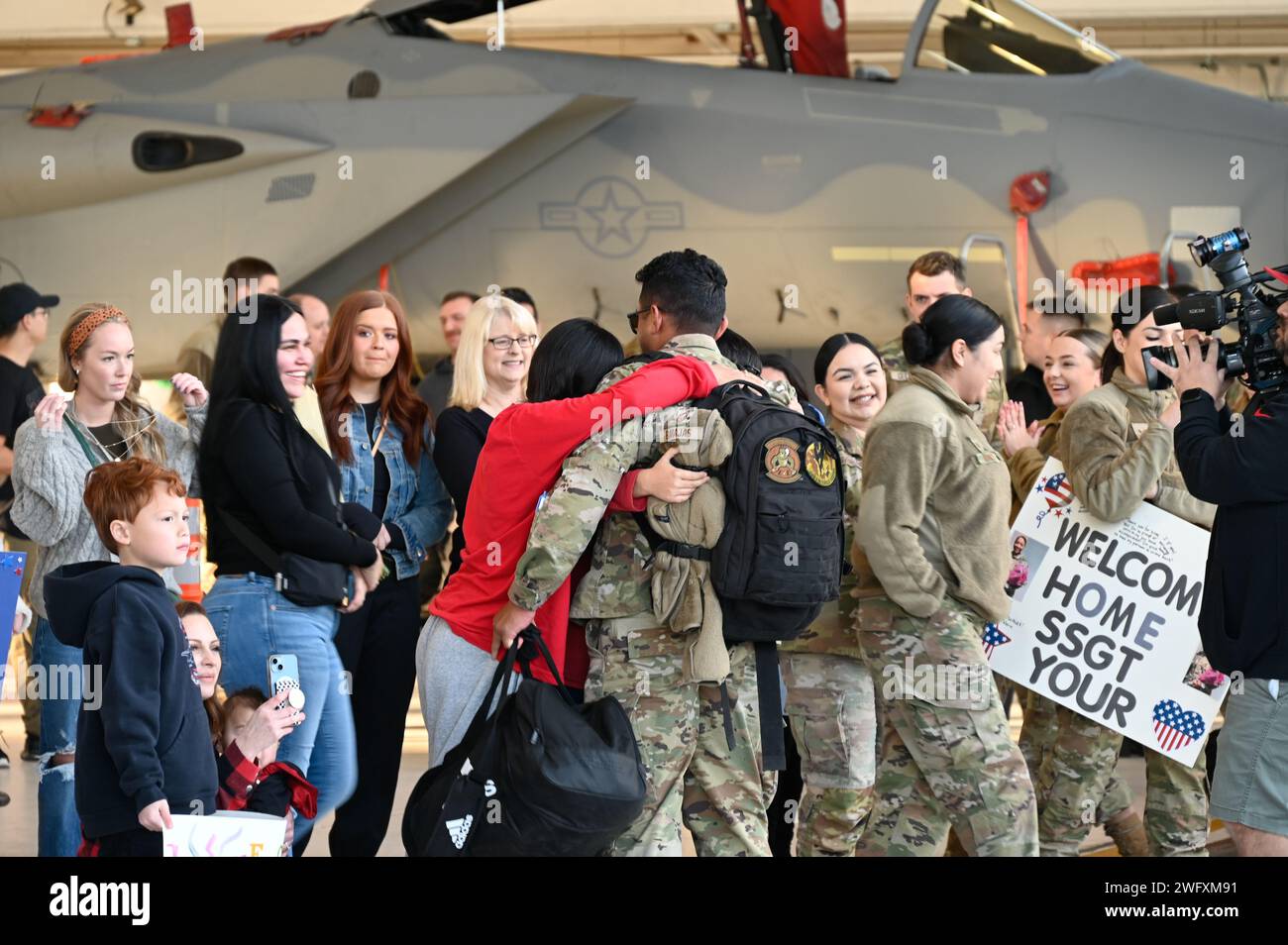 Families and friends welcome home Airmen from the California Air ...