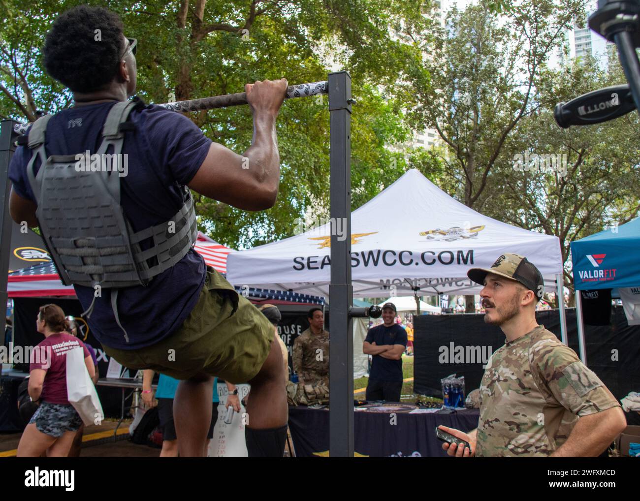 240112-N-LW994-1514 – MIAMI (Jan. 12, 2024) - A Navy SEAL inspects a ...