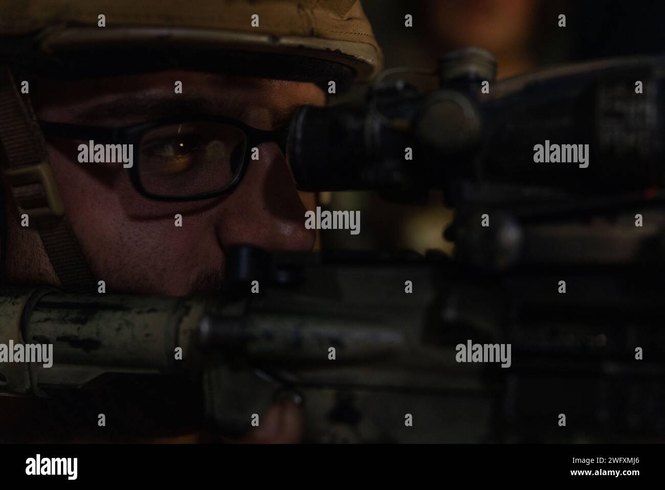 U.S. Marine Corps Cpl. Aidan Denman, a scout sniper with Battalion ...