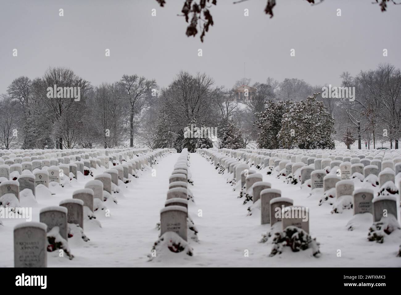 Snow falls at Arlington National Cemetery, Arlington, Va., Jan. 19 ...