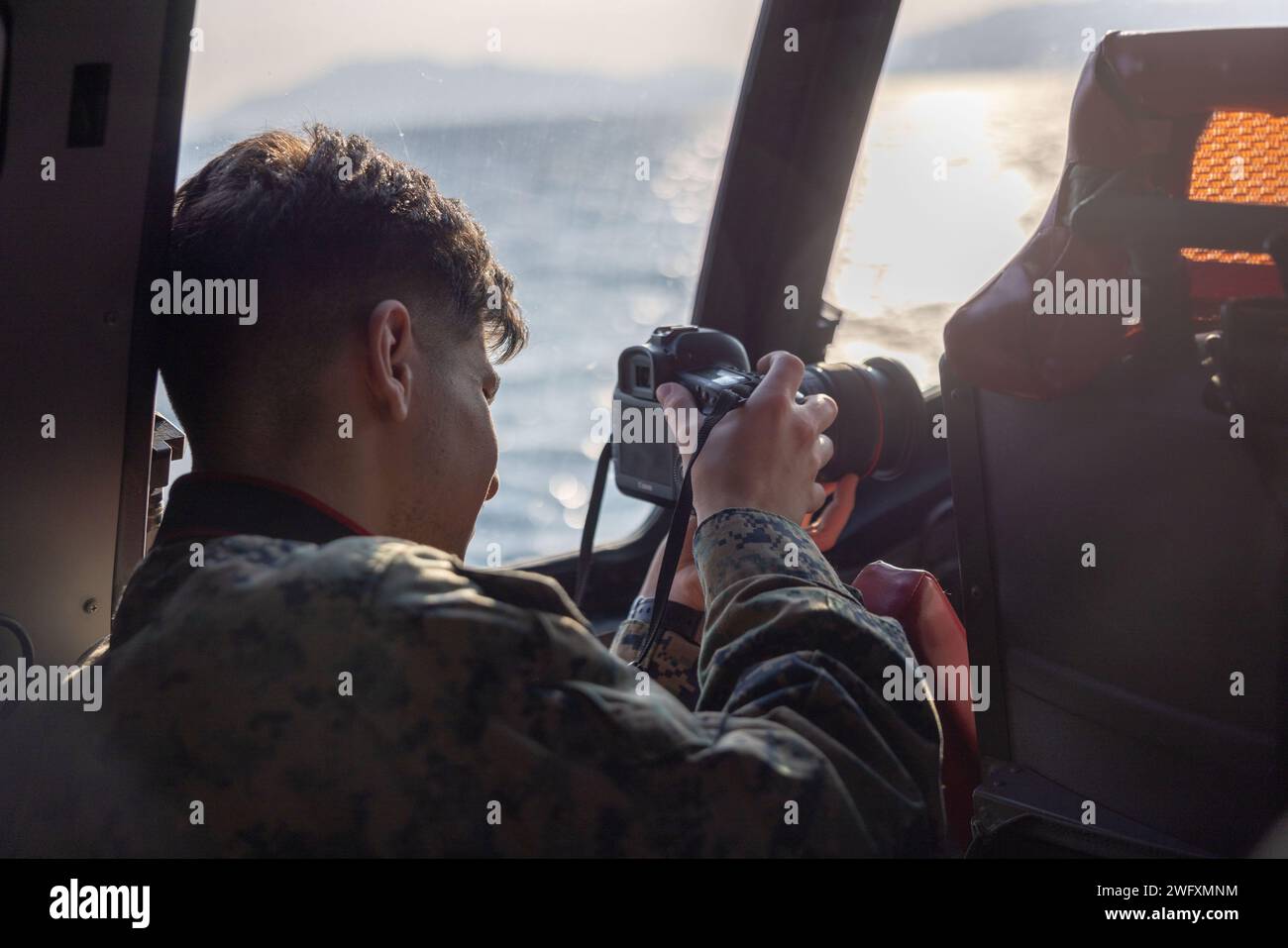 U.S. Marine Corps Lance Cpl. Colin Thibault, a combat videographer with ...