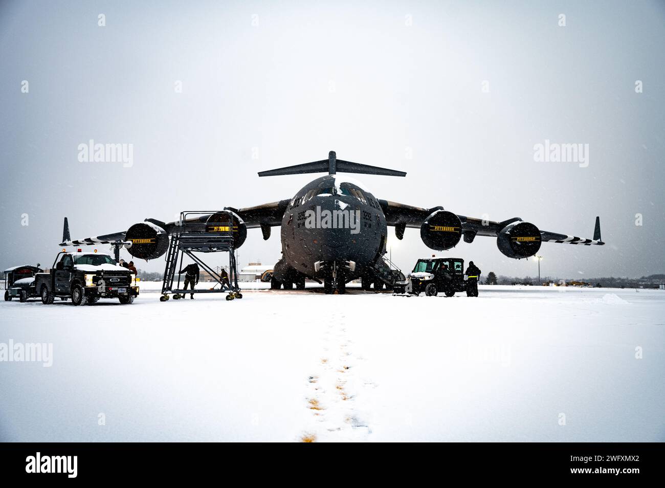 911th Aircraft Maintenance Squadron crew chiefs conduct snow removal ...