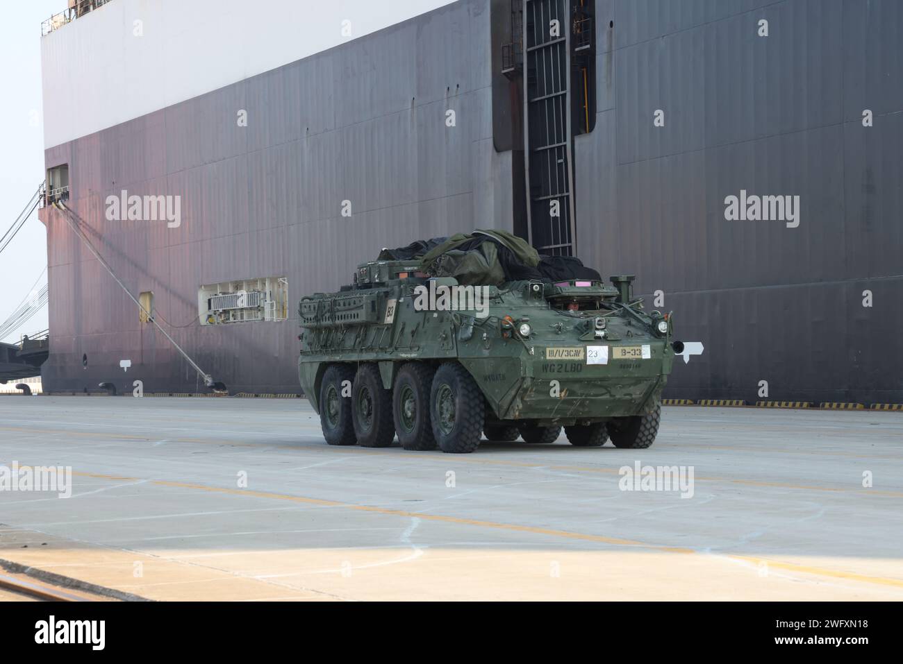 A U.S. Army Stryker vehicle is driven to a staging area after being ...