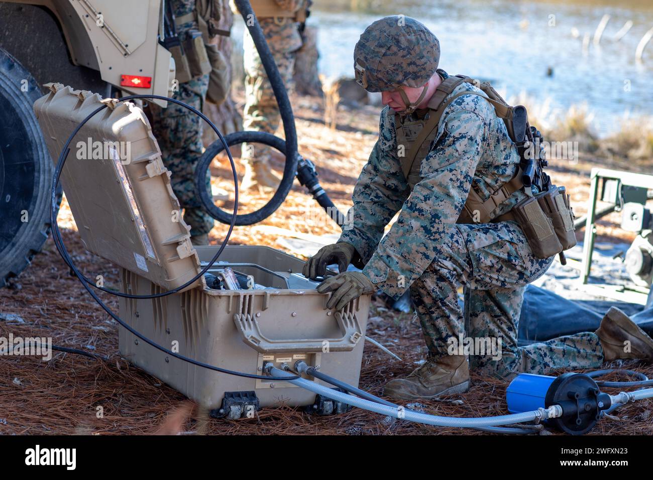 A U.S. Marine with Combat Logistics Battalion 24, 24th Marine ...