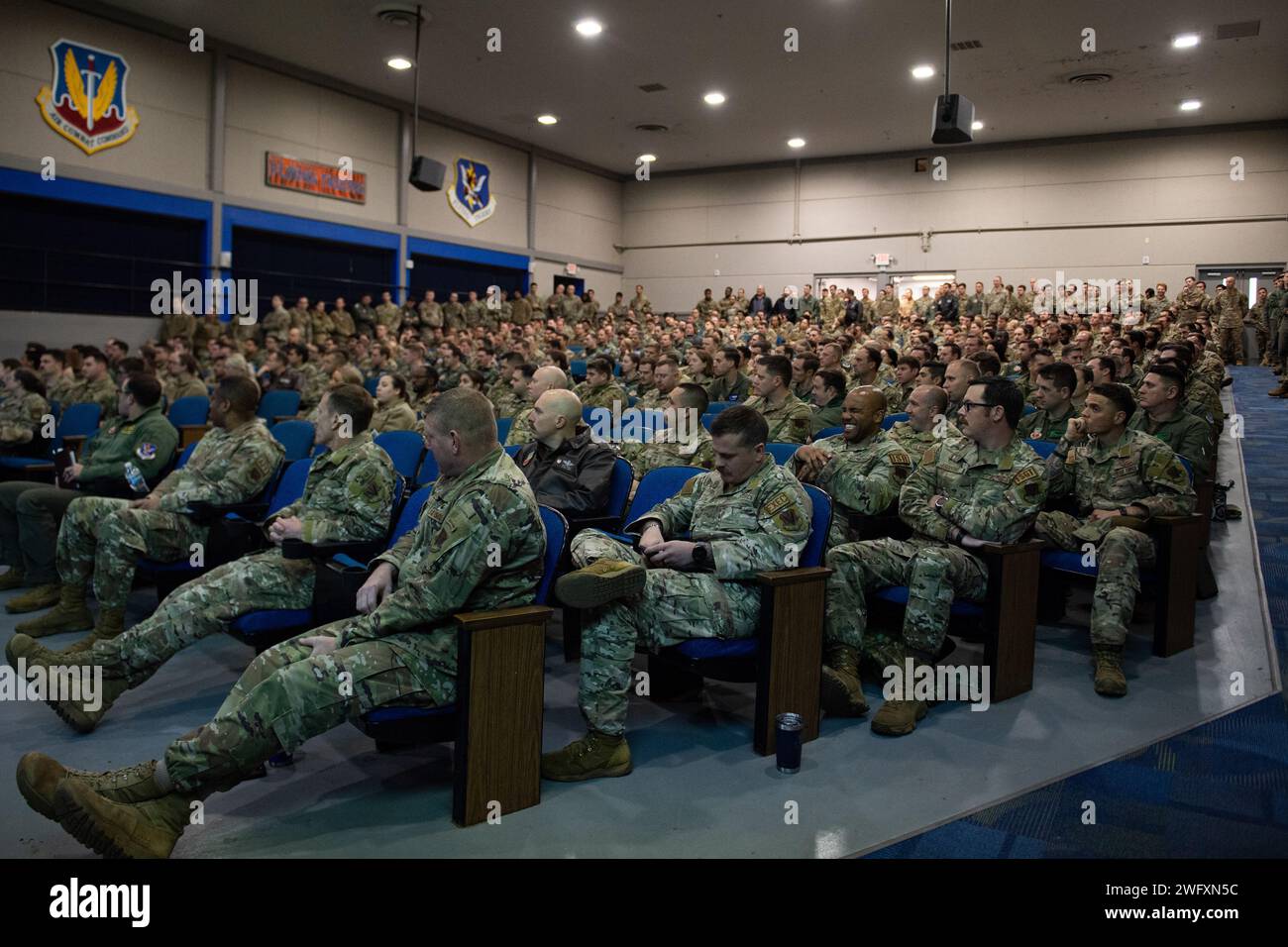 U.S. Air Force Airmen listen to the 23rd Wing command team speak at an ...