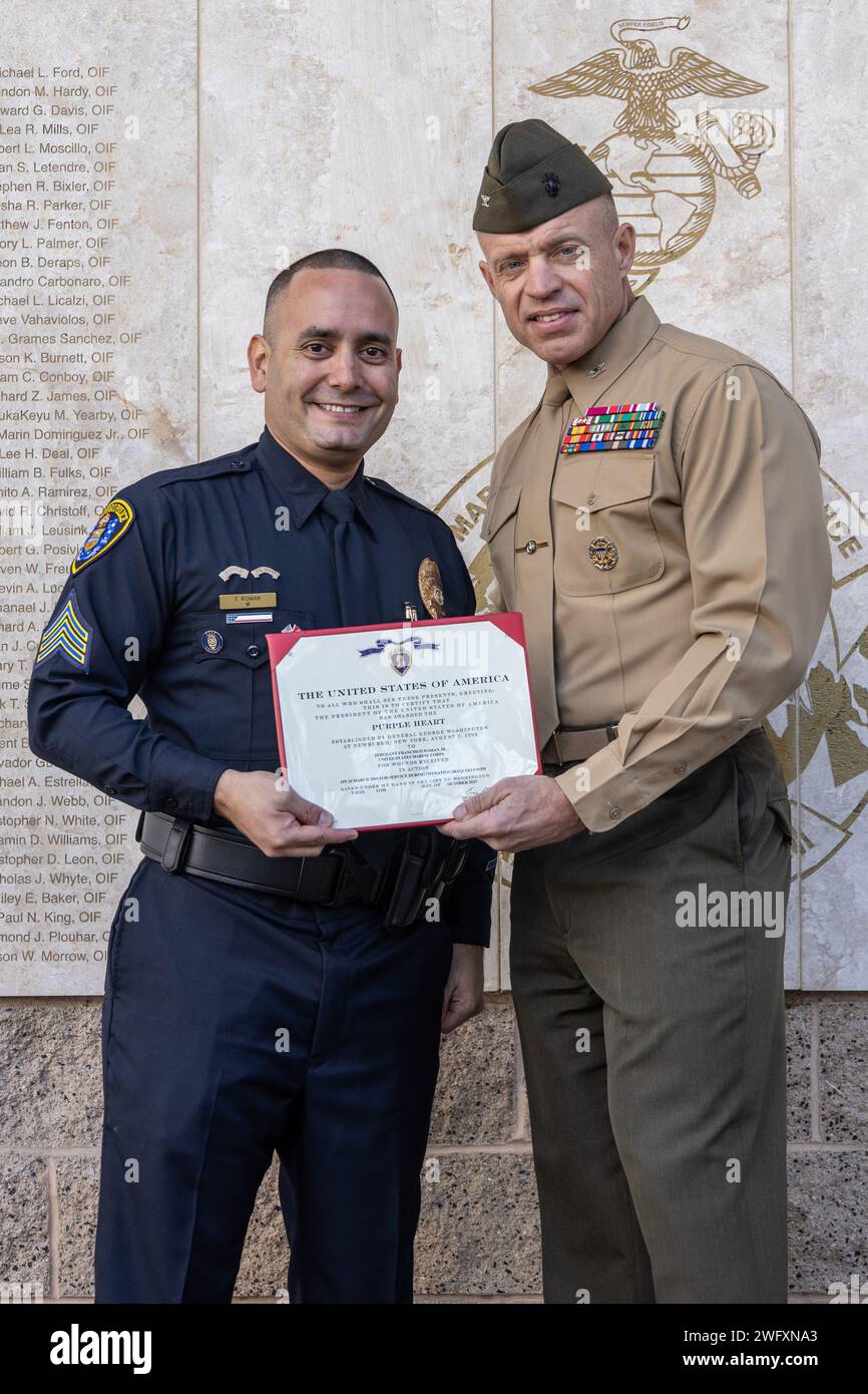 Francisco Roman Jr., left, a U.S. Marine Corps veteran of 1st Battalion ...