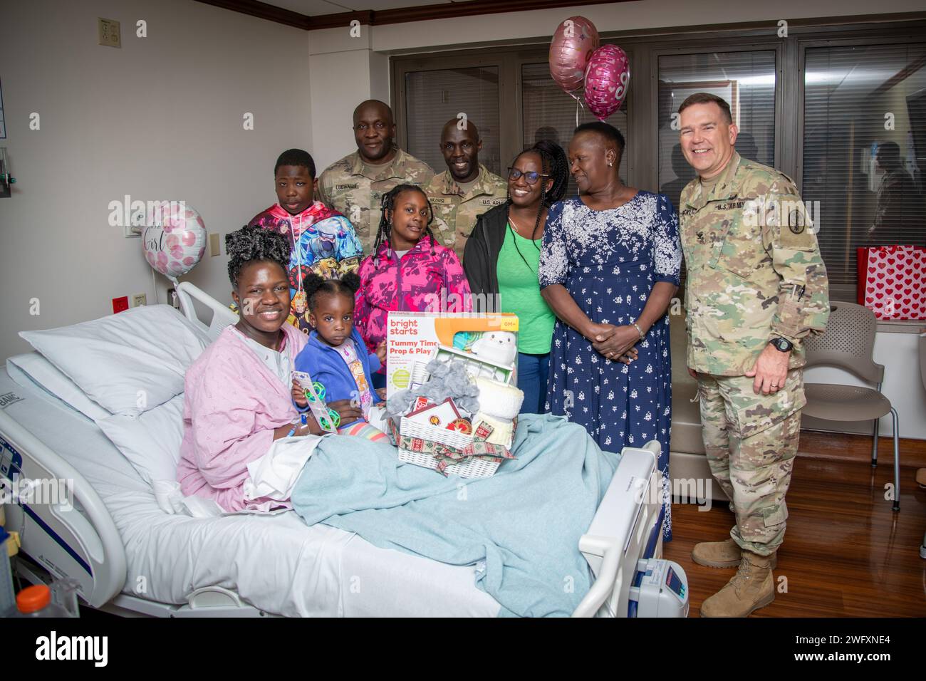 Col. Mark Stackle, Brooke Army Medical Center commander, presents Rhona ...
