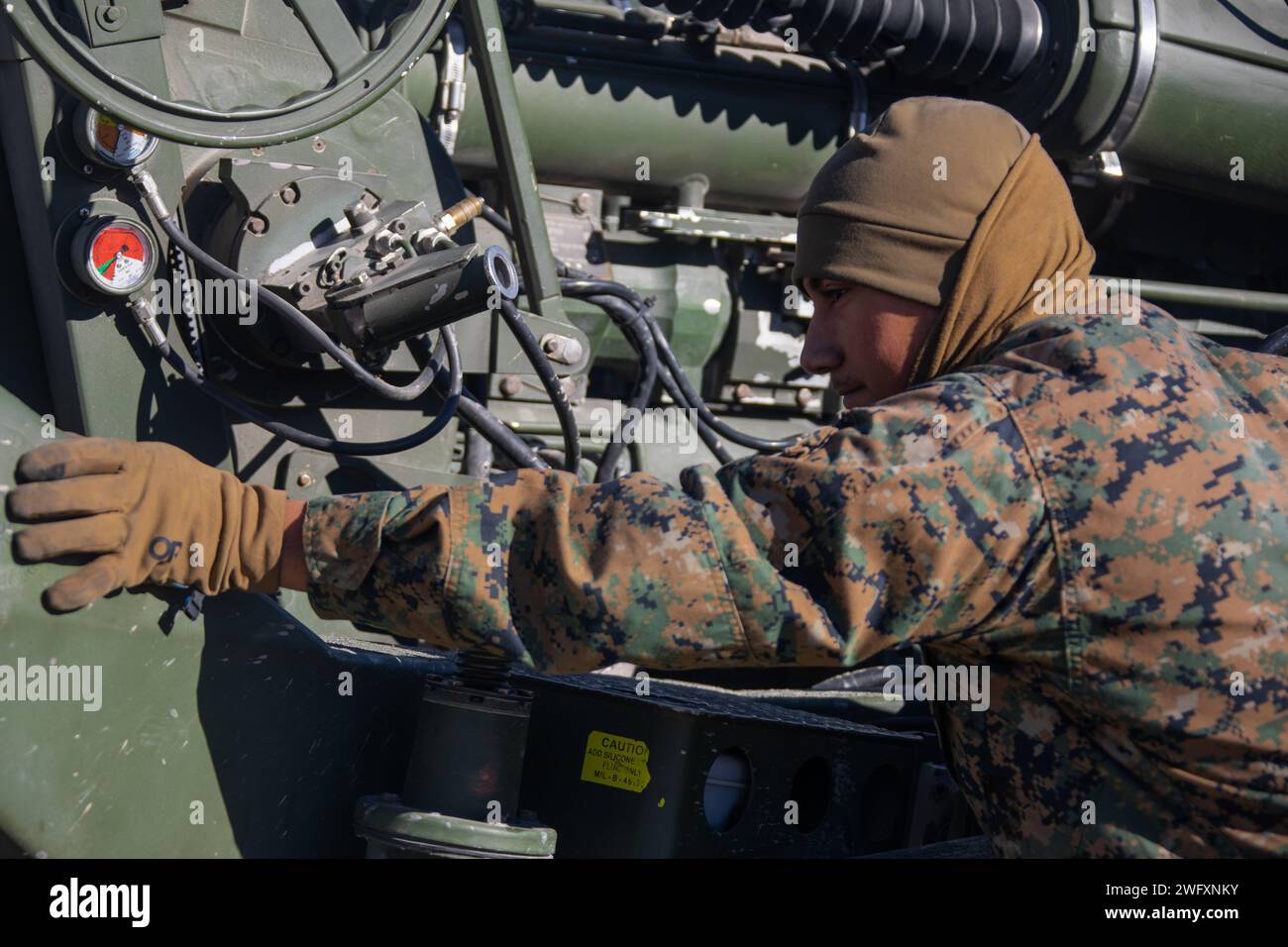 A U.S. Marine with Romeo Battery, Battalion Landing Team 1/8, 24th ...