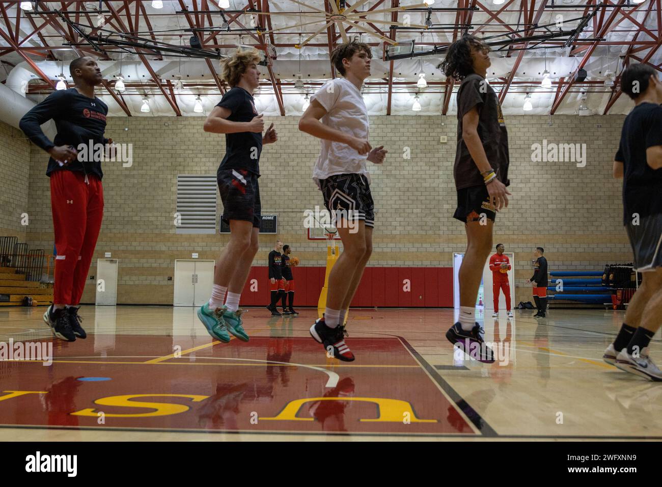 U.S. Marines with the All-Marine Men’s Basketball Team lead a ...