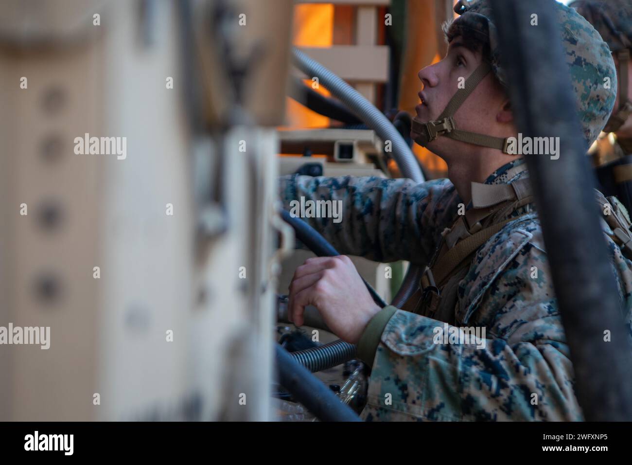 A U.S. Marine with Combat Logistics Battalion 24, 24th Marine ...