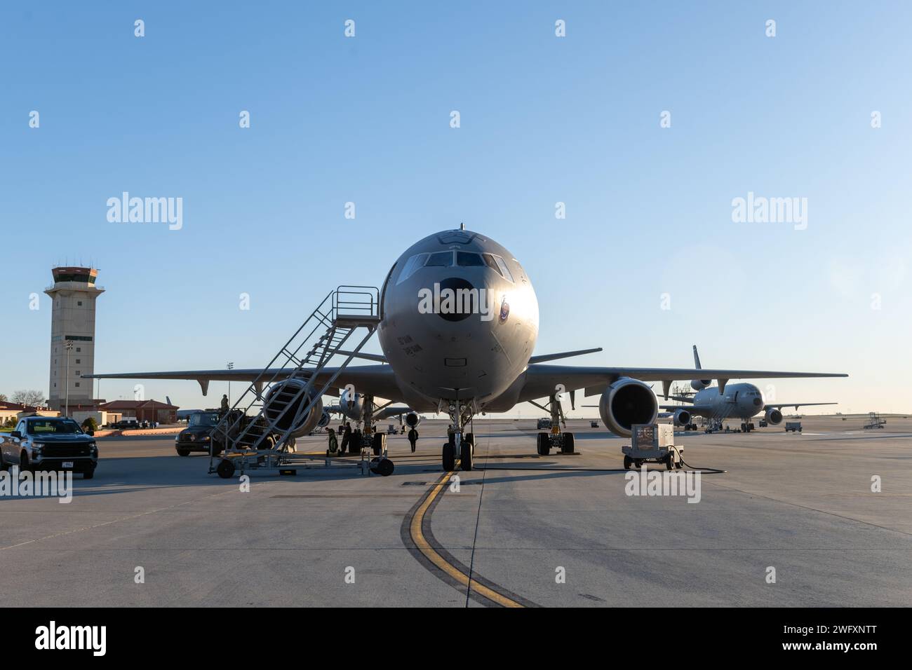 U.S. Airmen from the 9th Air Refueling Squadron inspect a KC-10 ...