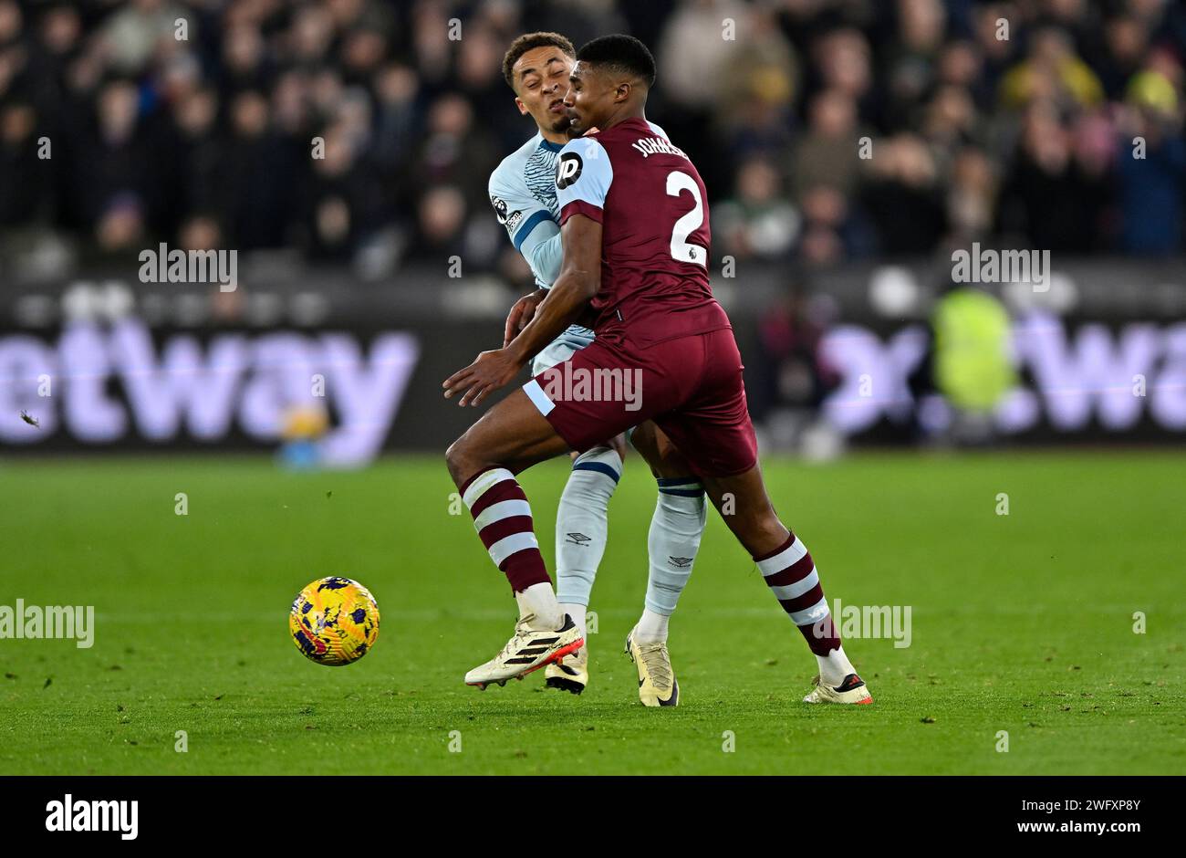London, UK. 1st Feb, 2024. Ben Johnson (West Ham) and Marcus Tavernier ...