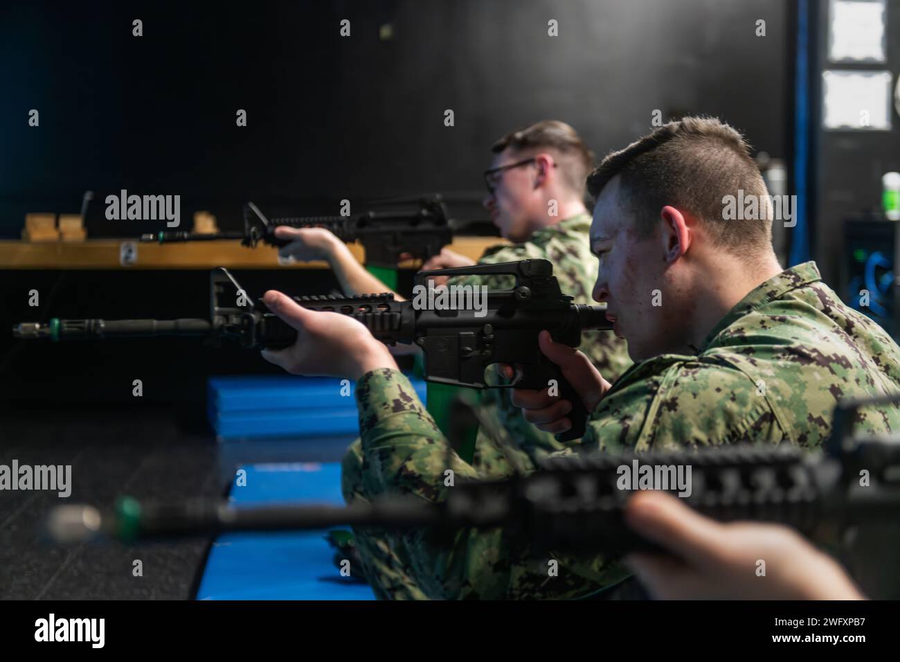 GREAT LAKES, Il. (January 9, 2024) Accession Sailors operate M-4 rifles ...
