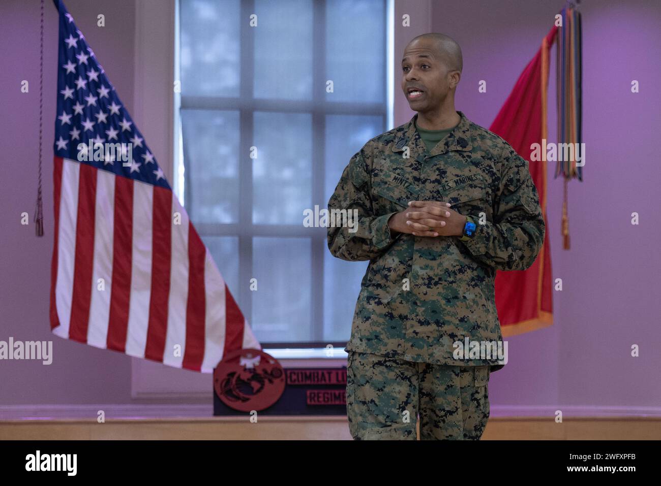 U.S. Marine Corps Sgt. Maj. Paris Mintz, left, incoming sergeant major ...