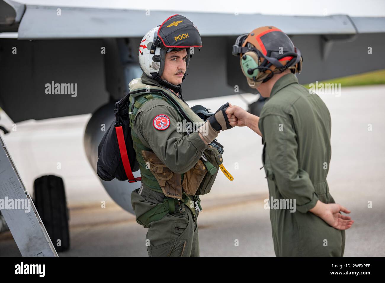 U.S. Marine Corps Capt. John Peacock, left, a pilot, and Cpl. Jessy ...