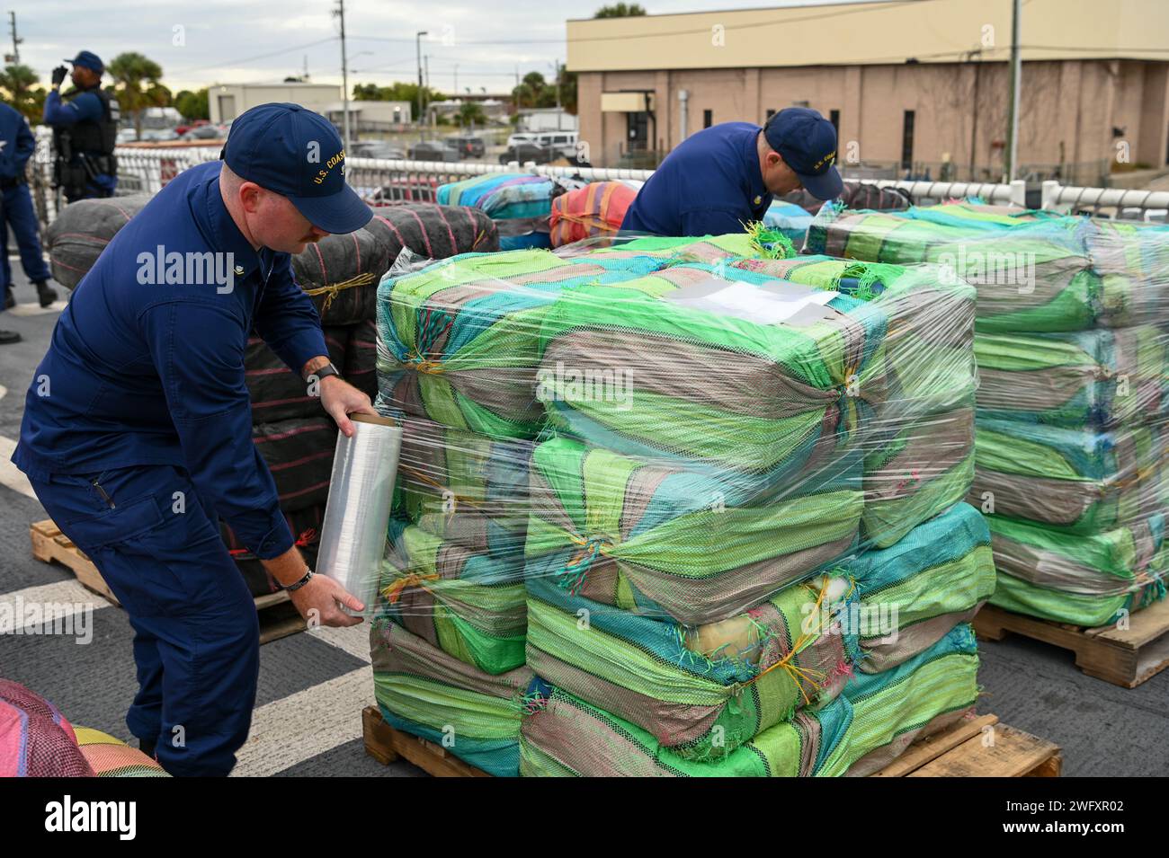 Crew of Coast Guard Cutter Resolute saran wraps illegal narcotics on ...
