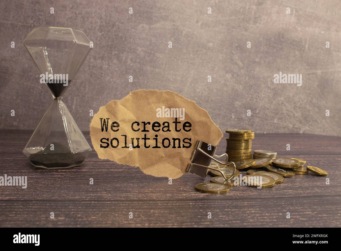 text text We create solutions appearing behind torn brown paper Stock ...