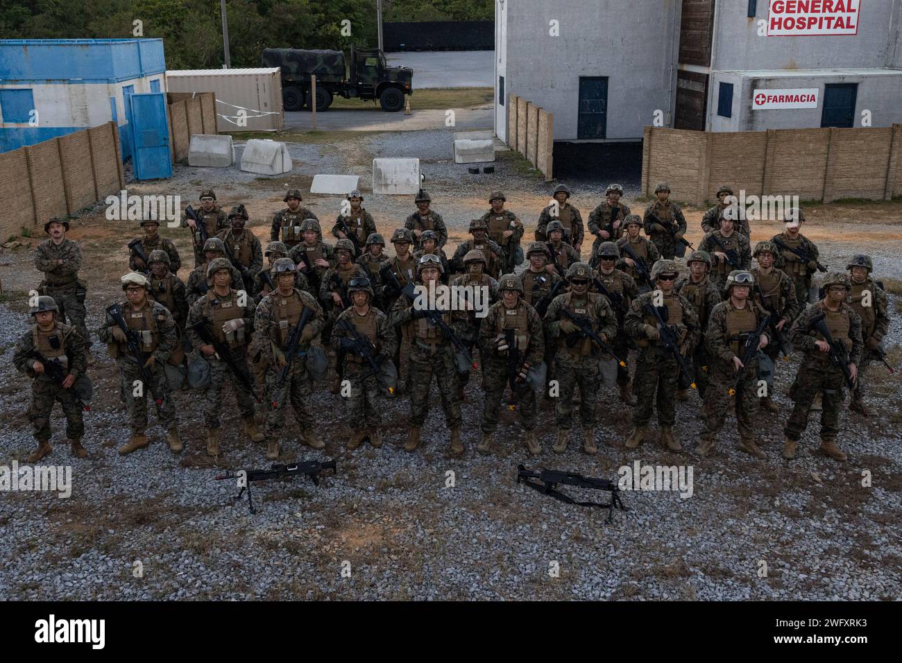 U.S. Marines with Marine Wing Headquarters Squadron (MWHS) 1 pose for a ...