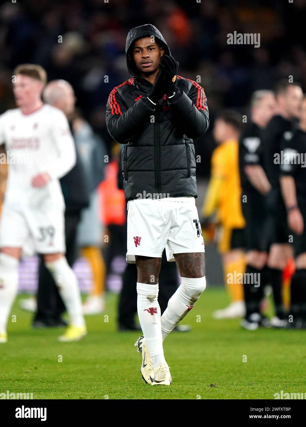 Manchester United's Marcus Rashford applauds the fans at the end of the ...