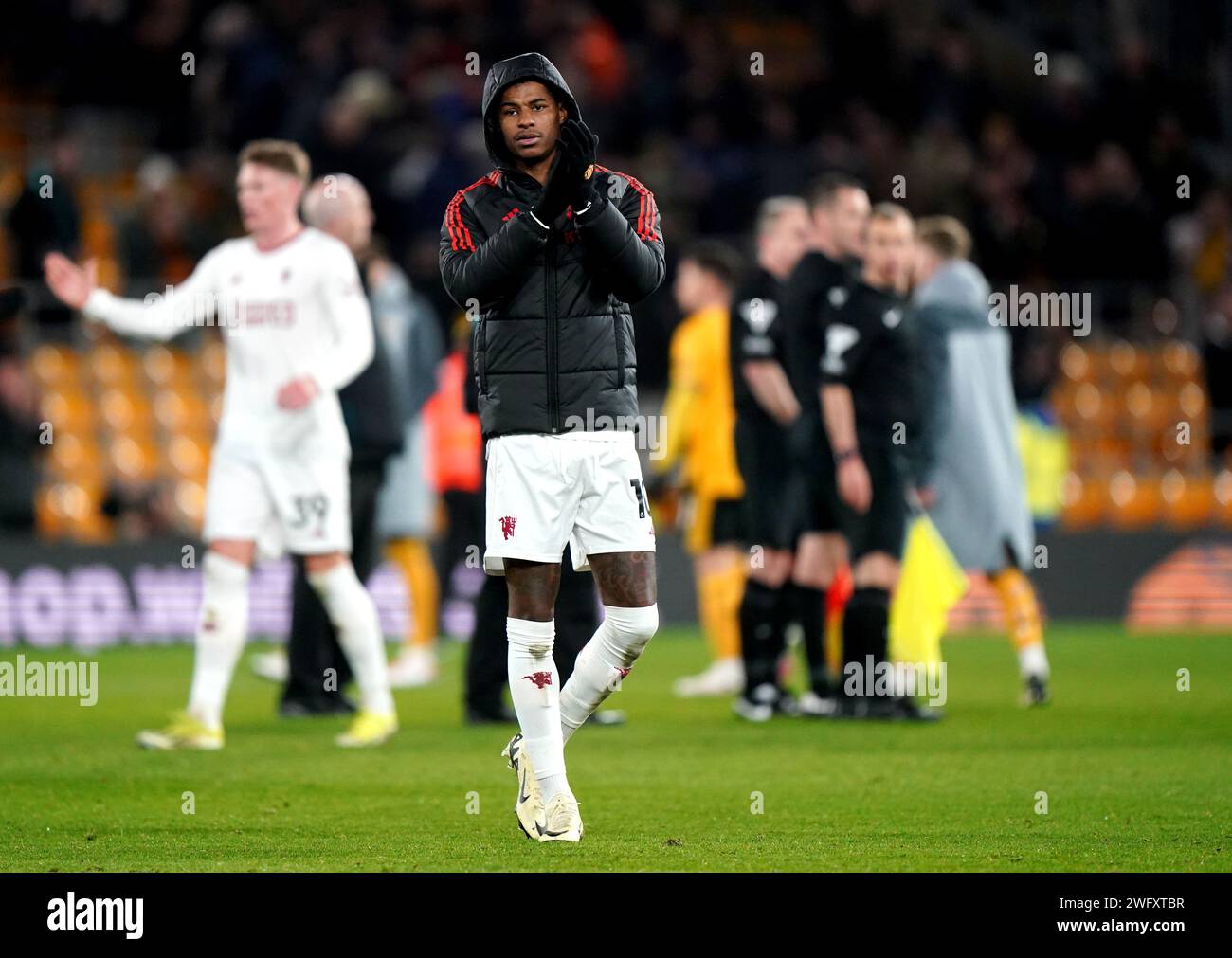 Manchester United's Marcus Rashford applauds the fans at the end of the ...