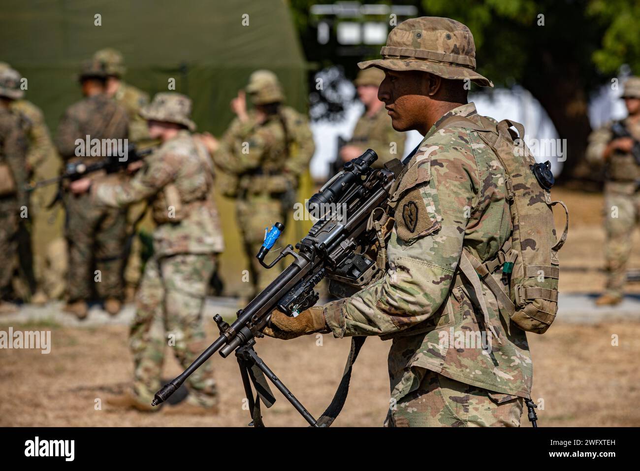 Two U.S. Army Soldiers, assigned to the 25th Infantry Division ...