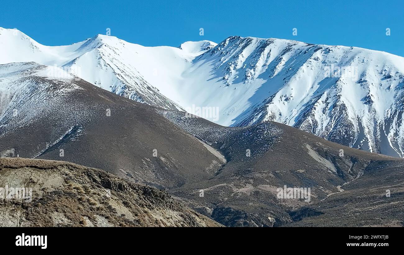 The mountains and hills around the Porters Pass ski fields Stock Photo ...