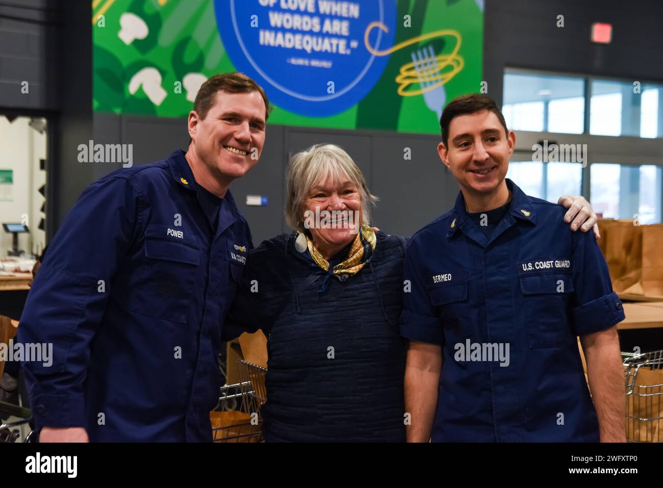 U.S. Coast Guard Lt. Cmdr. Michael Power and Chief Petty Officer George ...