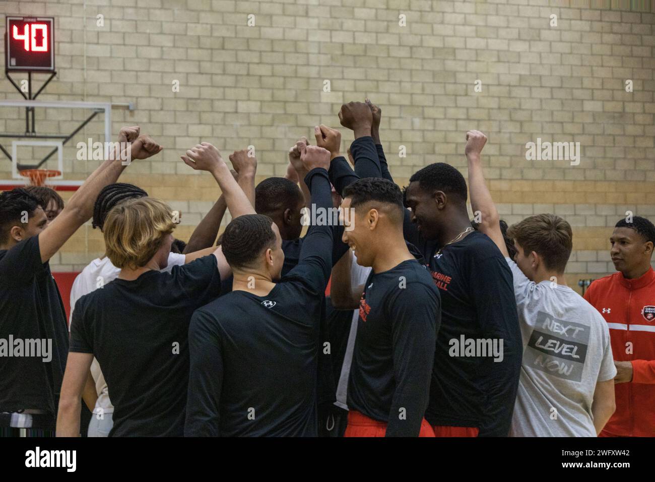 U.S. Marines with the All-Marine Men’s Basketball Team lead a ...