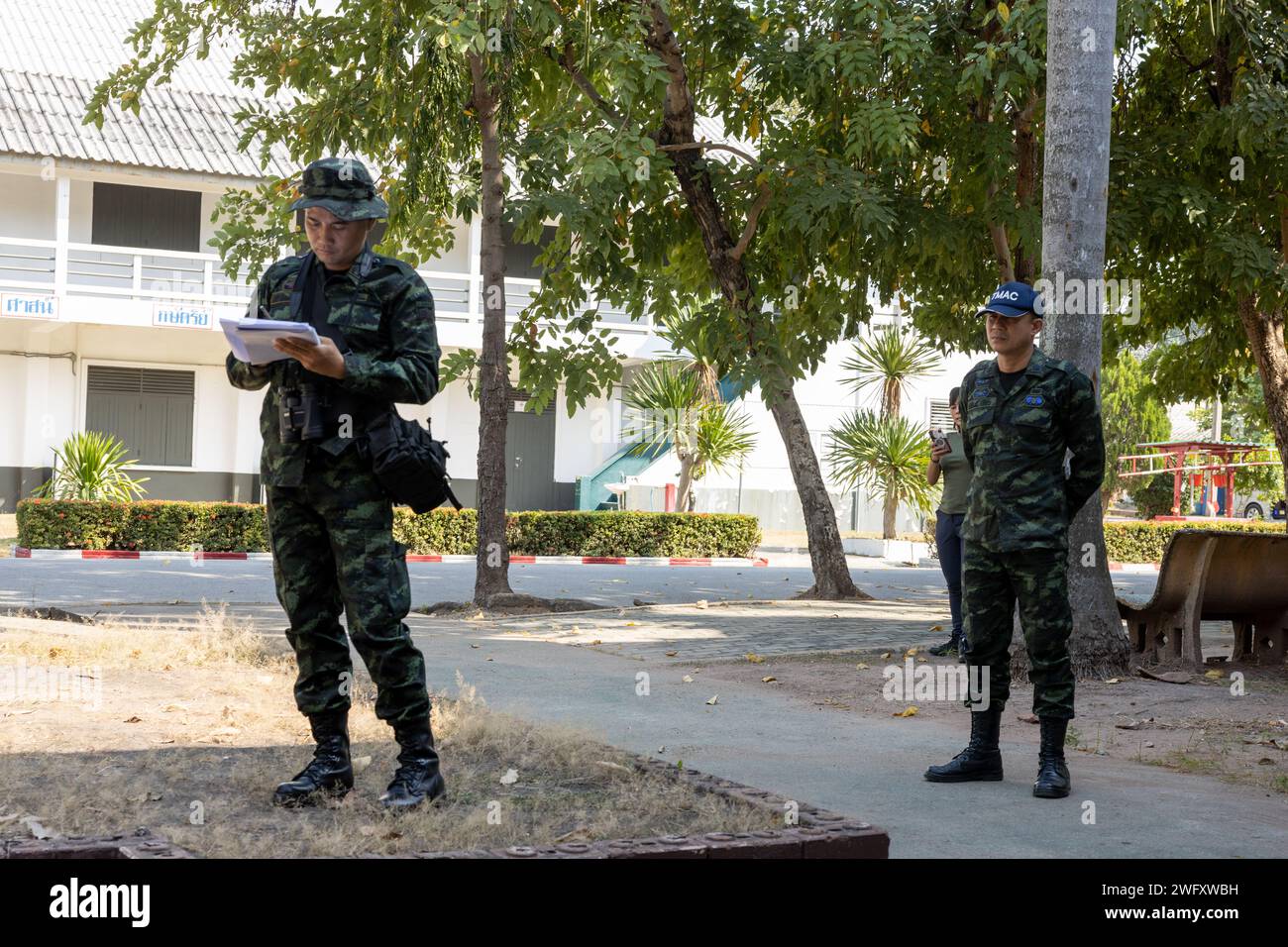 Royal Thai Army Master Sgt. Suparerk Panthong, right, an instructor ...