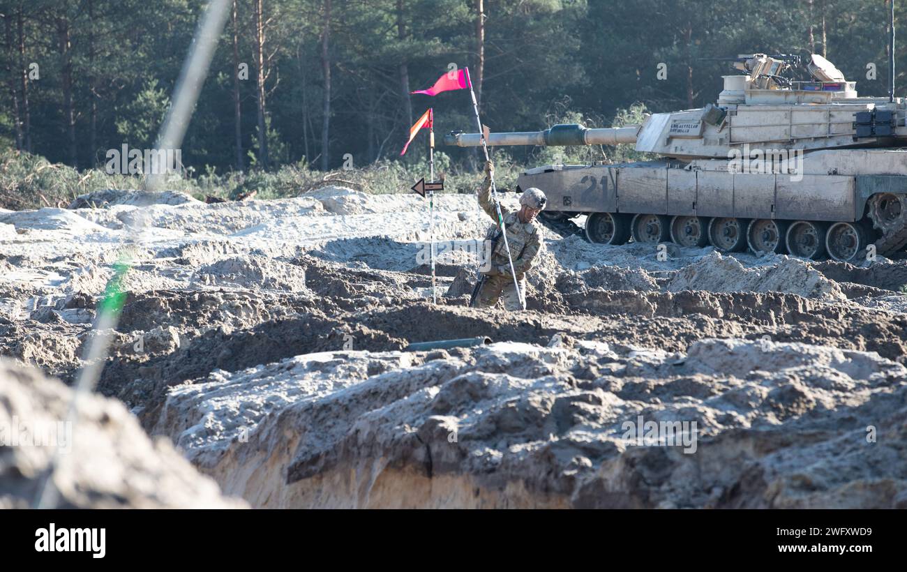Soldiers assigned to the Alpha Company, 40th Brigade Engineer Battalion attached to the 1st ...