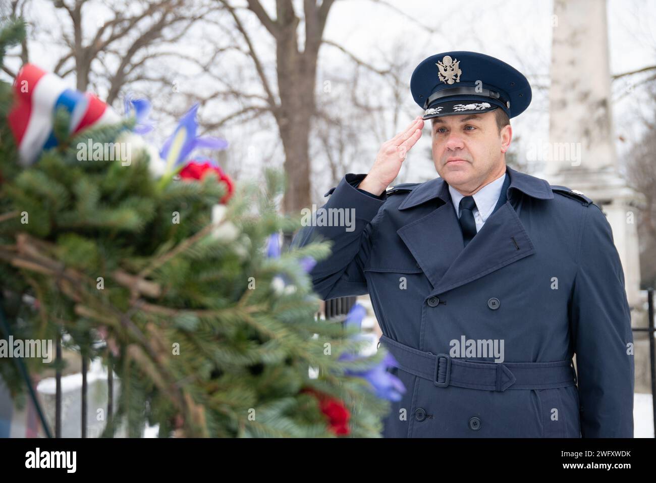 Lt Col Randy Allen, 107th Operations Support Squadron commander, lays a ...