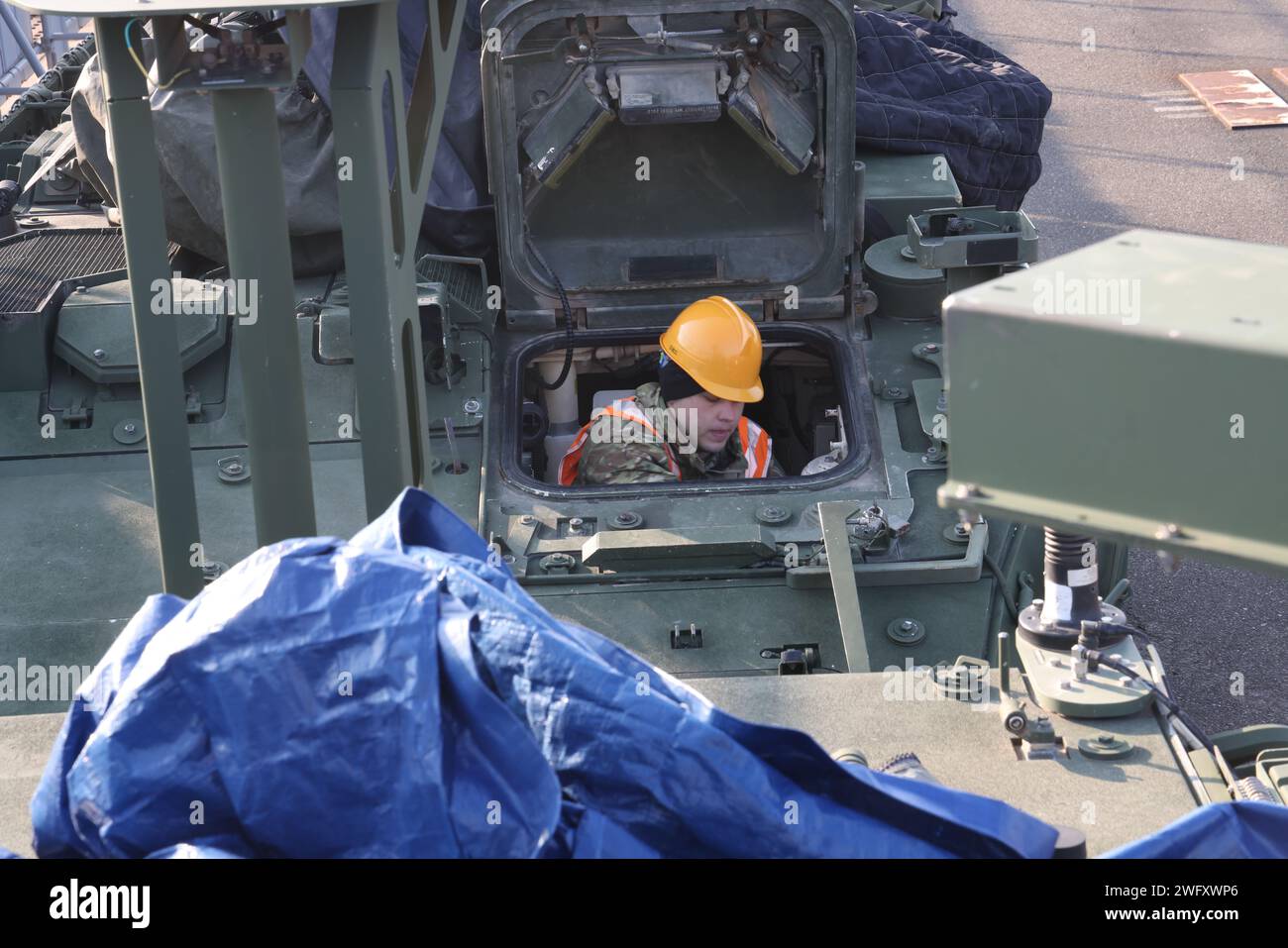 A U.S. Army Soldier assigned to 4th Infantry Division drives a Stryker ...