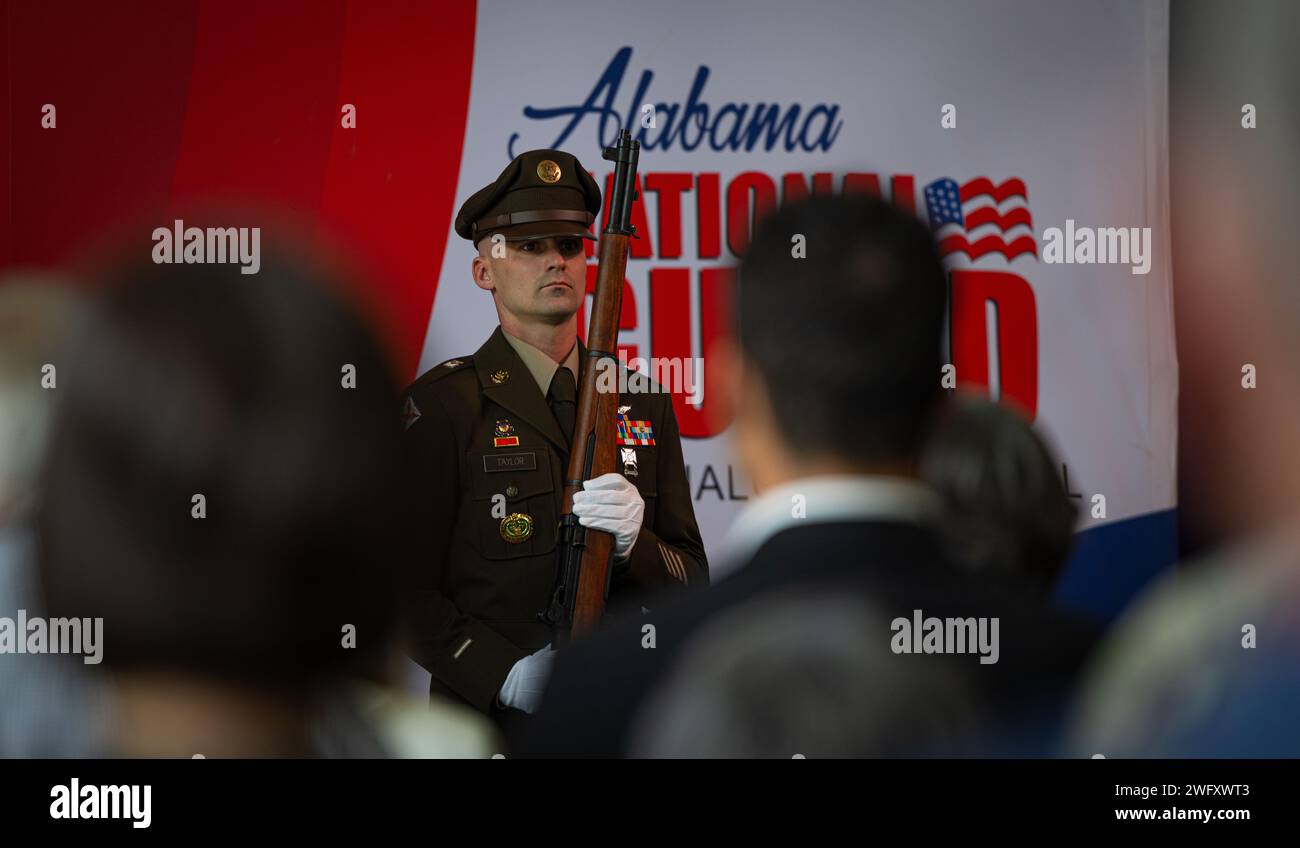 A member of the Alabama National Guard Honor Guard stands at attention ...
