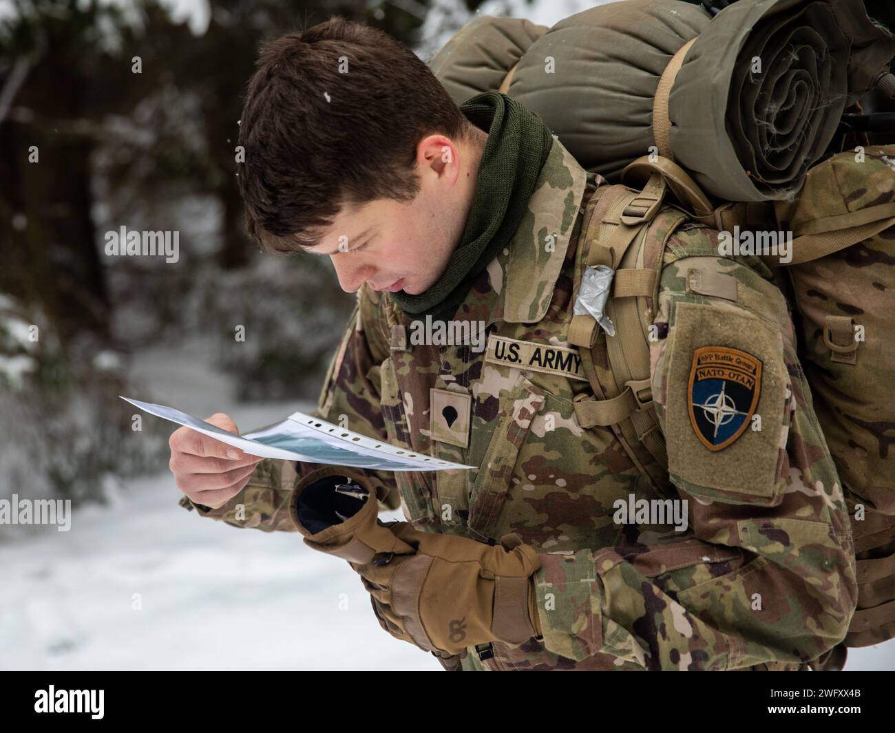 U.S. Army Spc. Zachary C. Smith, an assistant gunner with Headquarters ...
