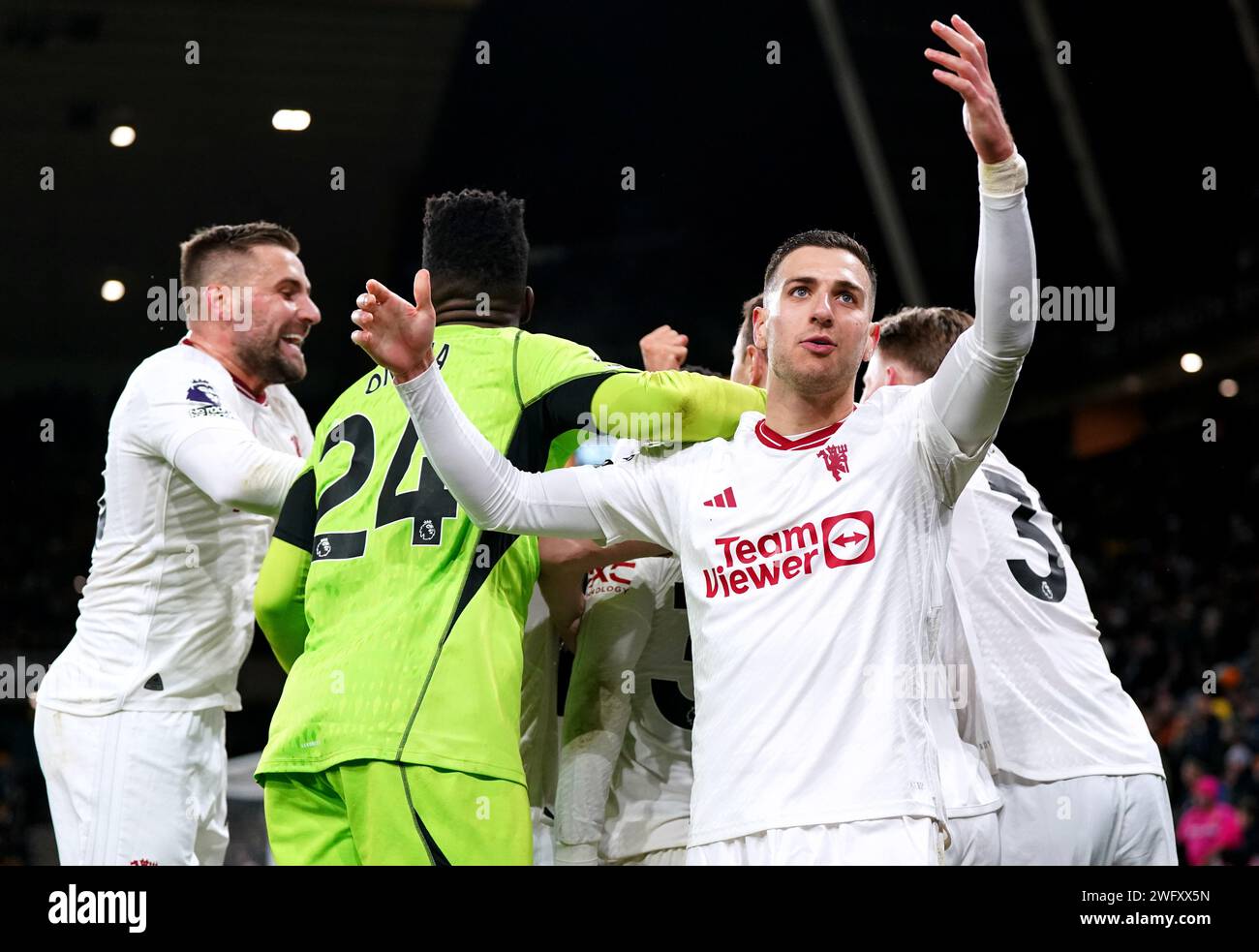 Manchester United's Diogo Dalot celebrates after team-mate Kobbie ...