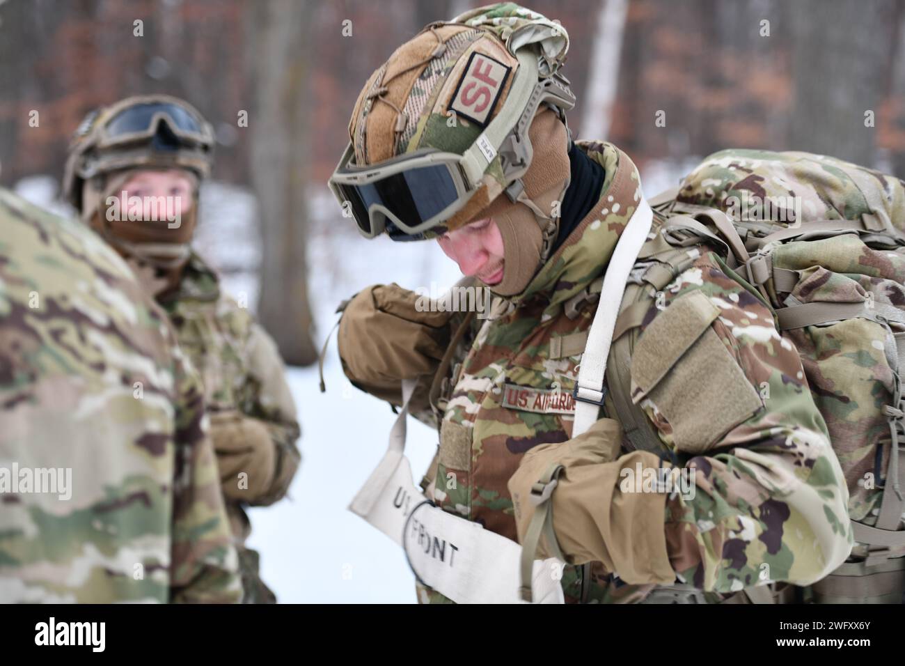 Air National Guard Security Forces specialists get ready for a hike in ...