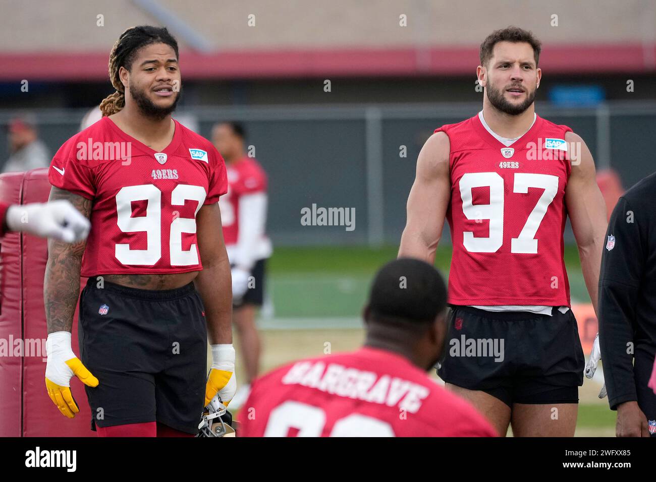 San Francisco 49ers defensive end Chase Young (92) and defensive end ...