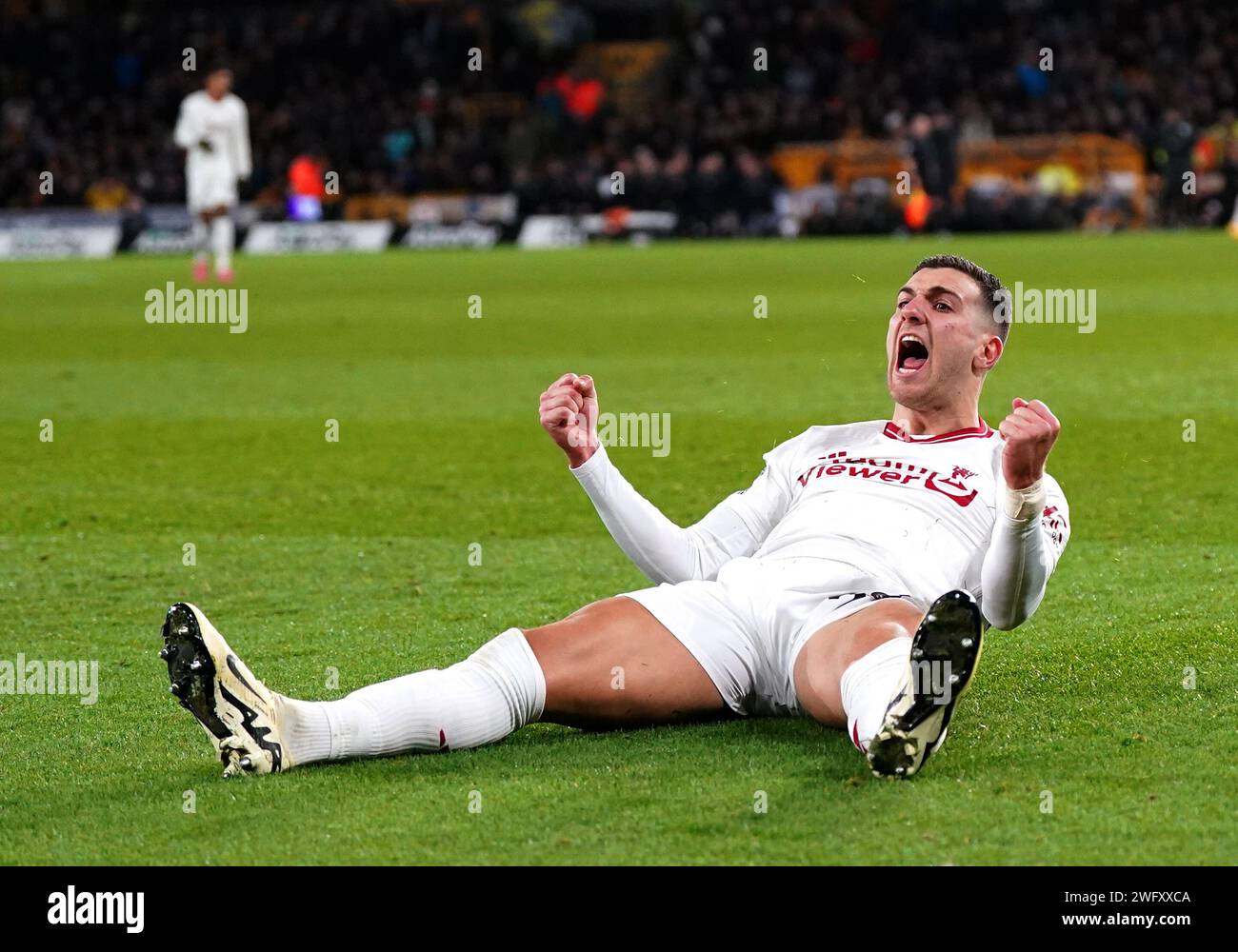 Manchester United's Diogo Dalot celebrates after team-mate Kobbie ...