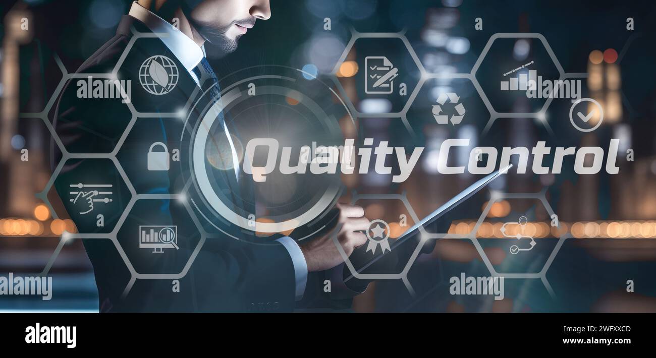 QMS businessman uses a pad at office. Night city skyline background ...