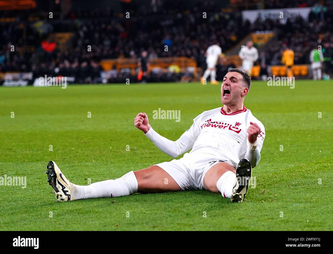 Manchester United's Diogo Dalot celebrates after team-mate Kobbie ...