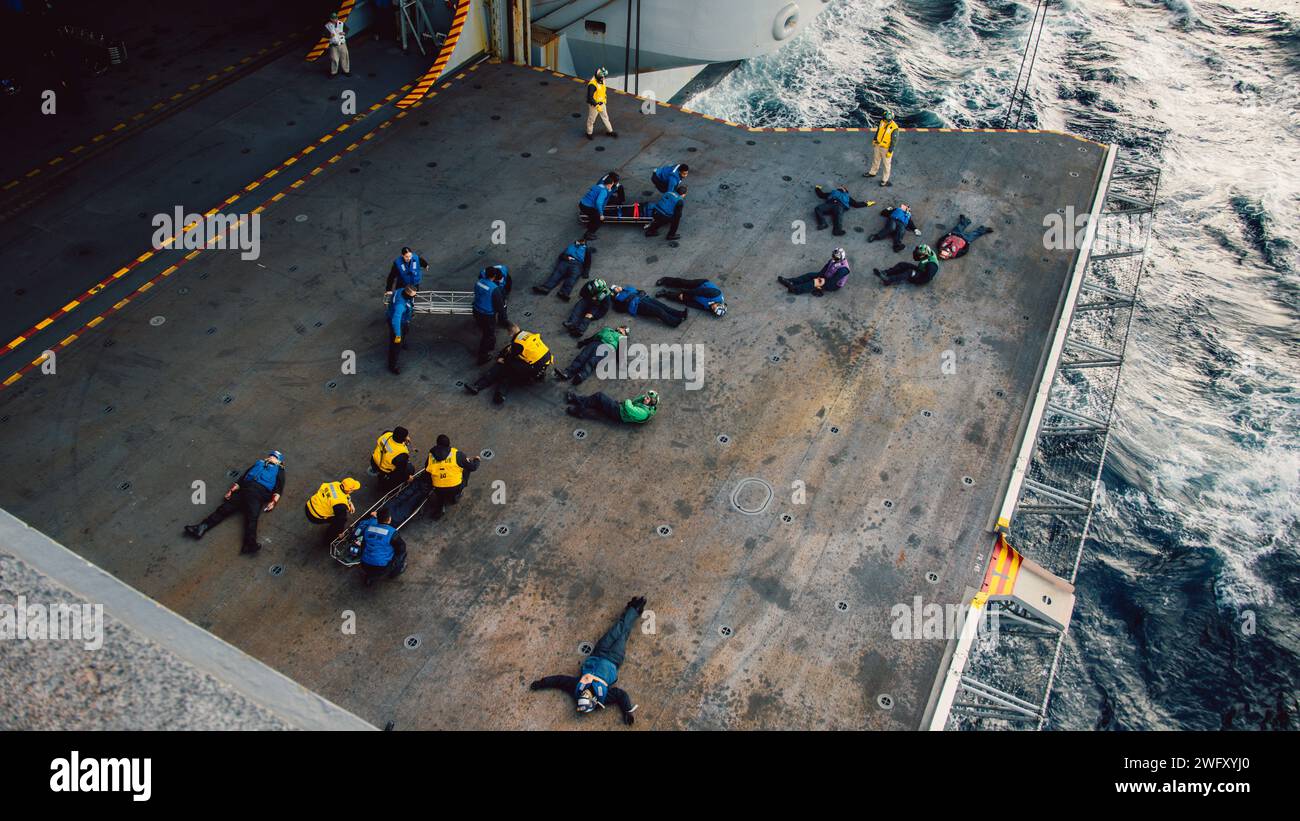Sailors participate in a mass casualty drill on Nimitz-class aircraft ...
