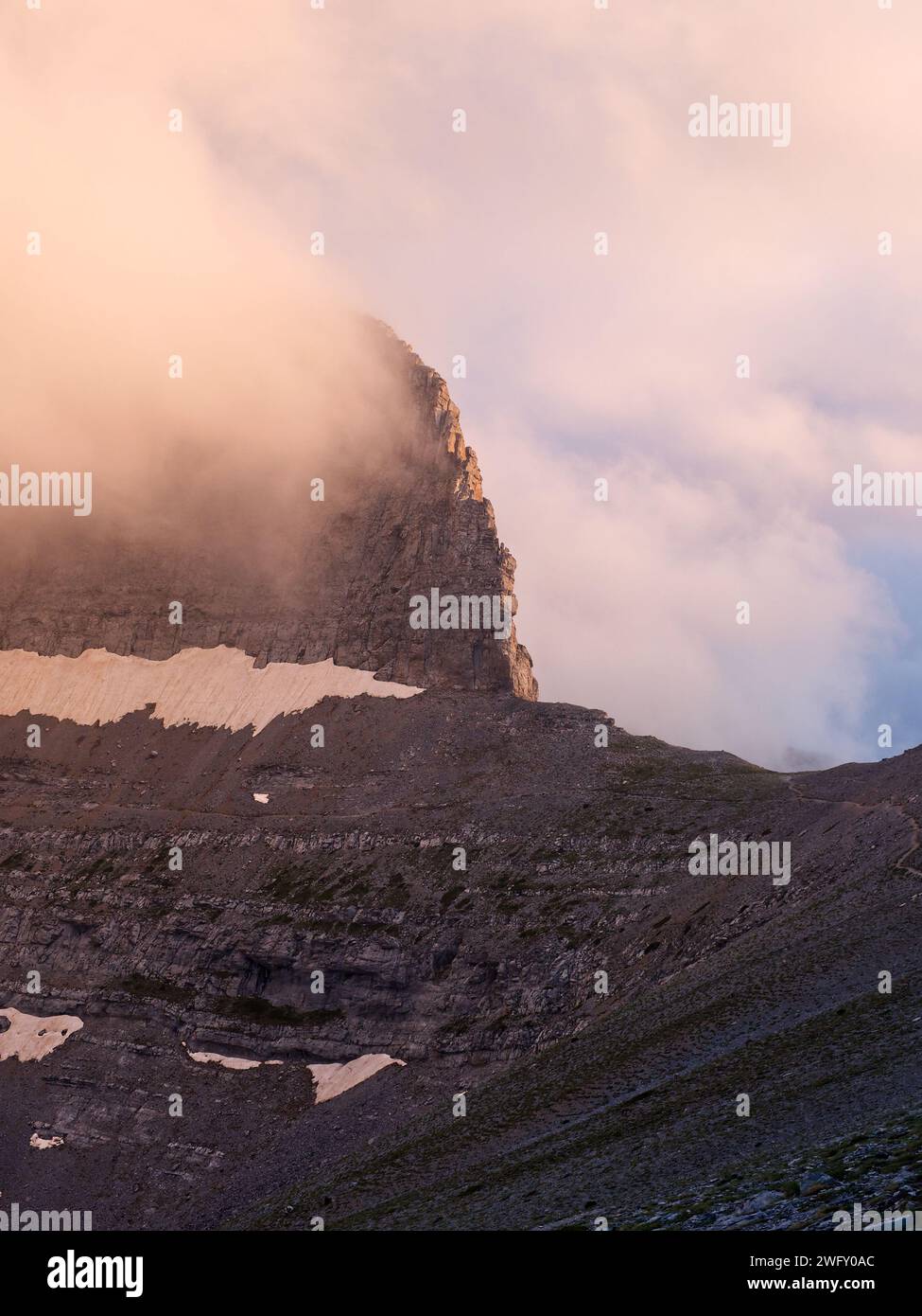 Olympus Mountain peak with clouds during sunset. Stefani peak also ...