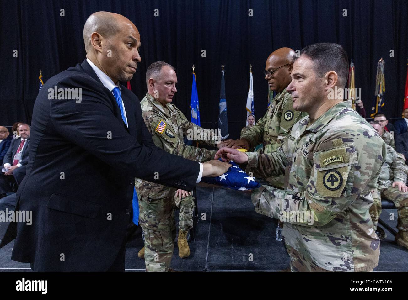 U.S. Sen. Cory A. Booker, left, and Brig. Gen. Robert W. Hughes, Jr ...