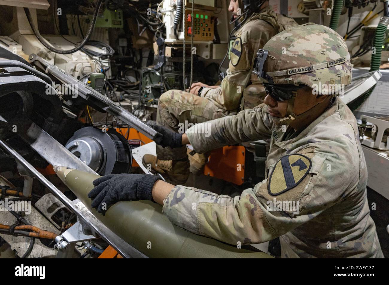Spc. Brandon Delgado, a U.S. Army Trooper assigned to Apex Battery, 2nd ...